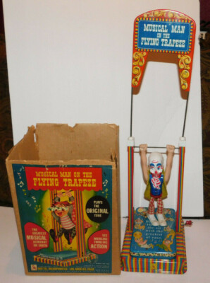 NEAT VINTAGE TIN WIND-UP MATTEL MUSICAL MAN ON THE FLYING TRAPEZE ...
