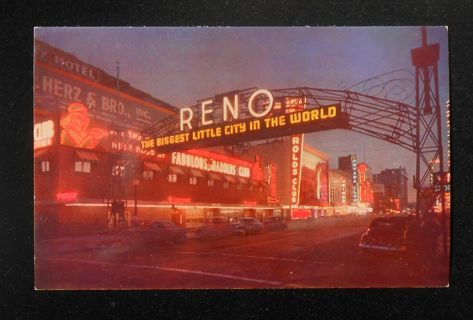 1940s Early Color View Reno Arch at Night Neon Signs Old Cars Reno NV ...