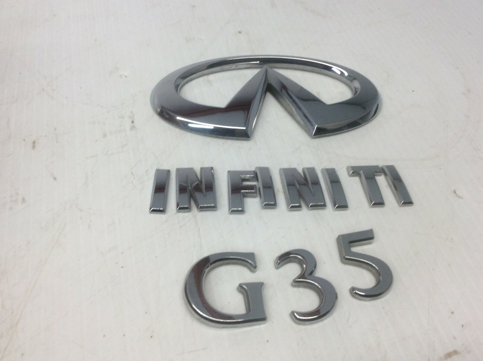07 Infiniti G35 Rear Trunk Lid Complete Emblem Badge F | eBay