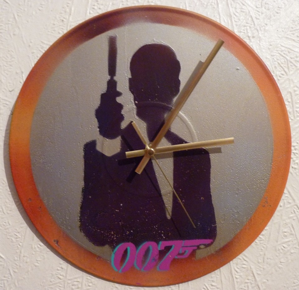 Wall clock..JAMES BOND 007 clocks. LICENCE TO Kill... SPECTRE.. Film's ...