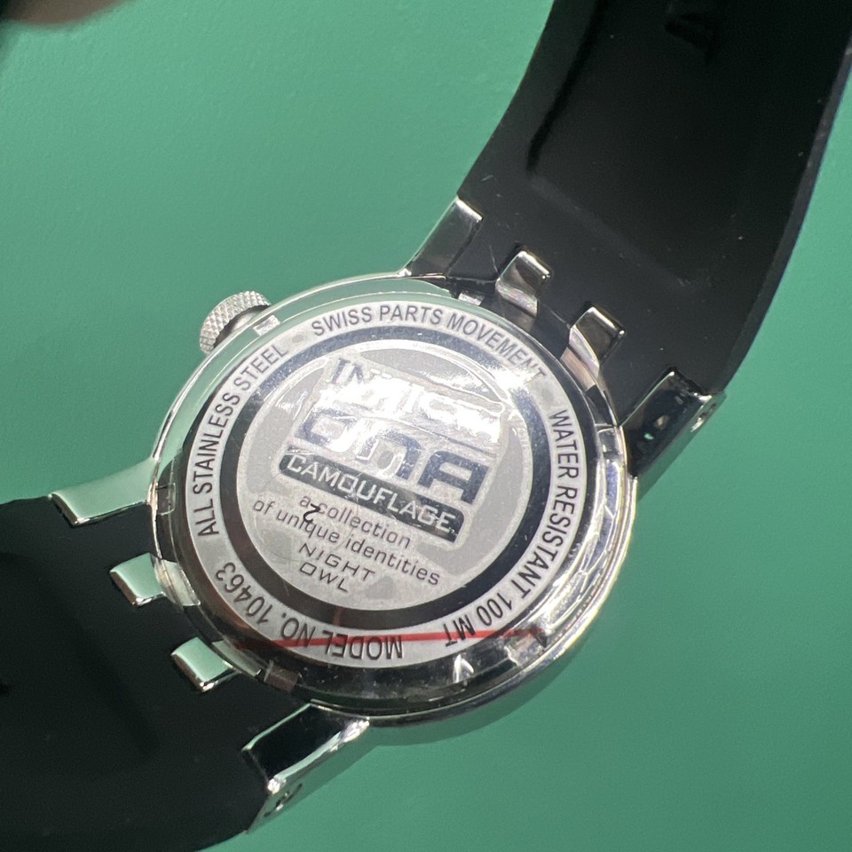 Invicta Men’s watch with a gray camouflage dial and a black silicone ...