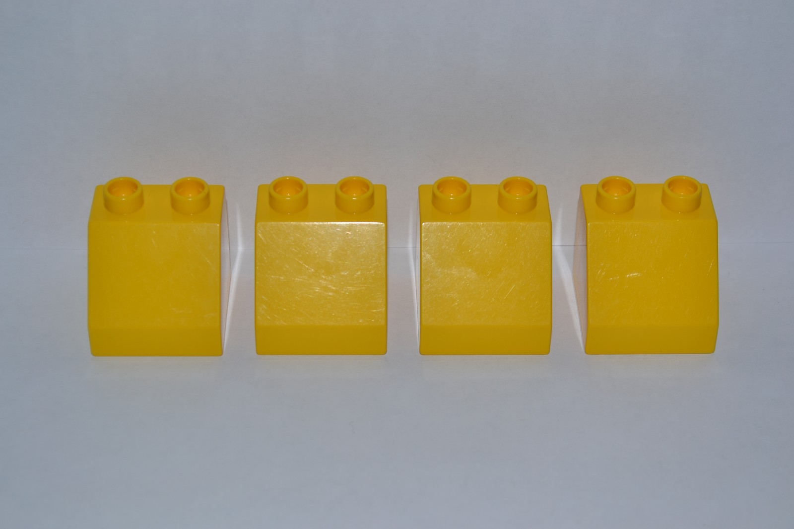 lot of 4 yellow Duplo blocks - 2X2 sloped blocks- combined shipping ...
