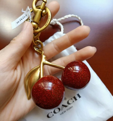 Coach Cherry Bag Charm KeyChain Glitter resin and metal Brass/Red Apple ...