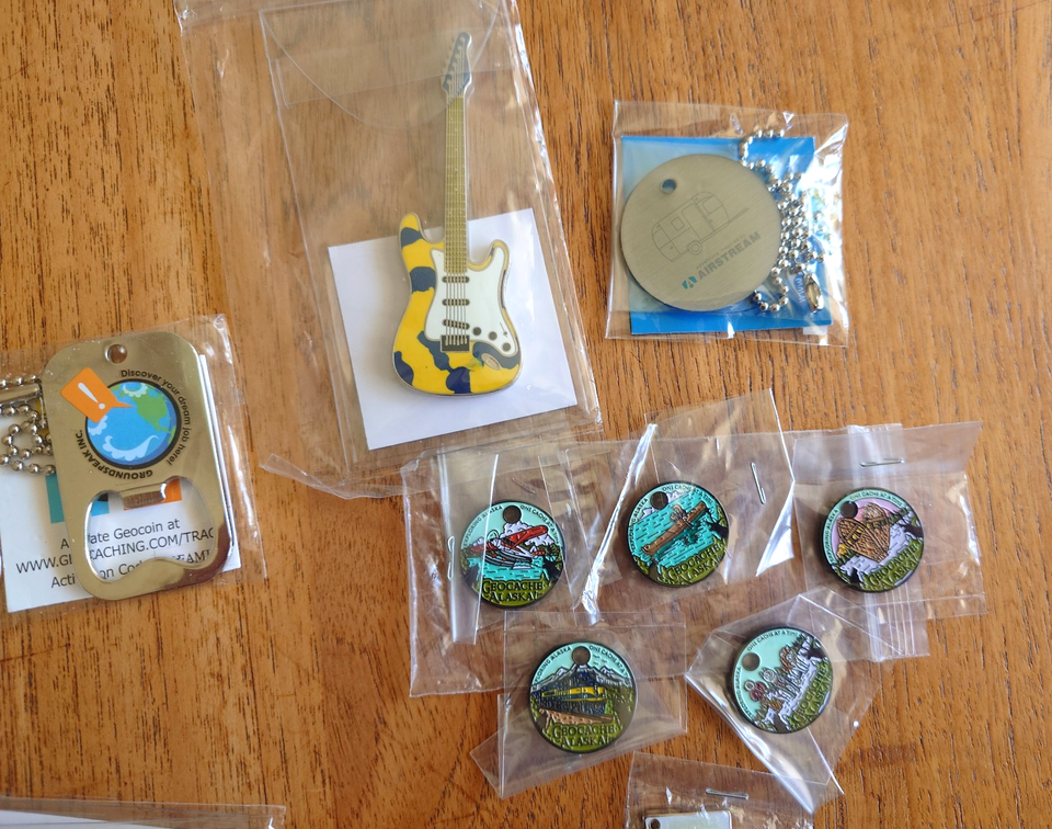 Lot 18 geocoins, travel bugs, trackable tags, and path tags ...