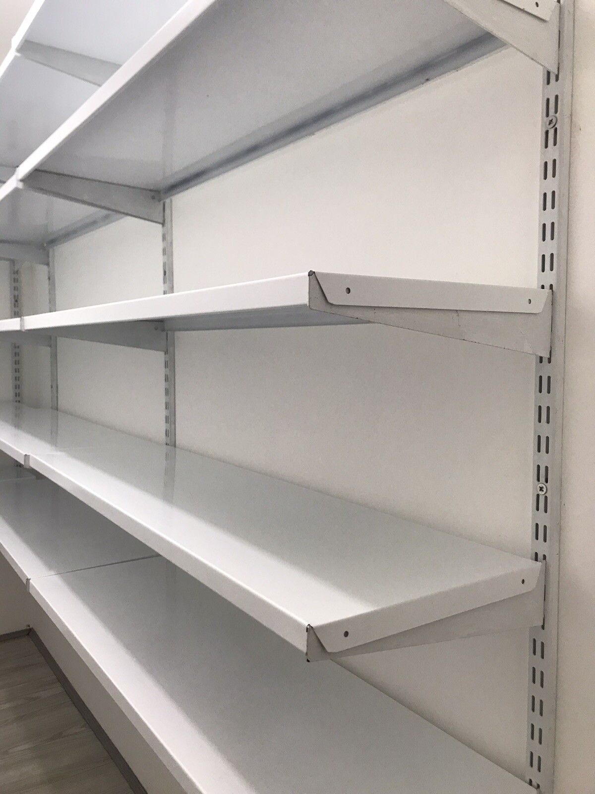 Wall shelves with twin slot uprights and brackets Adjustable shelving ...