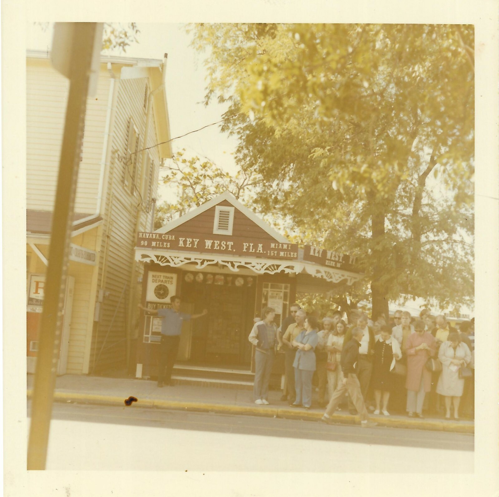 vintage color photo Key West Florida depot stop people wait for conch ...