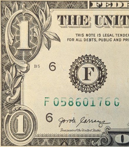 2017 A $1 fancy serial, inking error on left serial number. F 05860176 ...