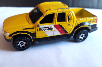 Matchbox Ford Explorer Sport Truck Beach Patrol Lifeguard 1/64 yellow ...