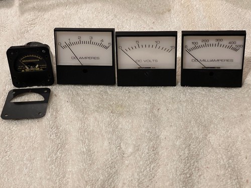 Amp/milliamp/microamp, and voltage panel meters, one is a vintage Beede ...