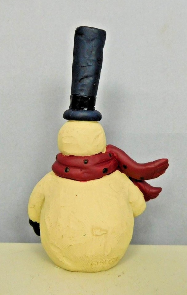 Sitting snowman with dangling legs and Peace on him - New Blossom ...