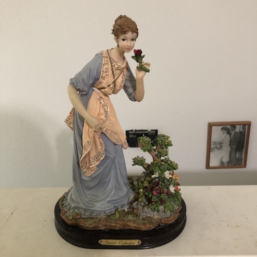gentili collection Statue Of Lady by A Large Bush Of Flowers ...