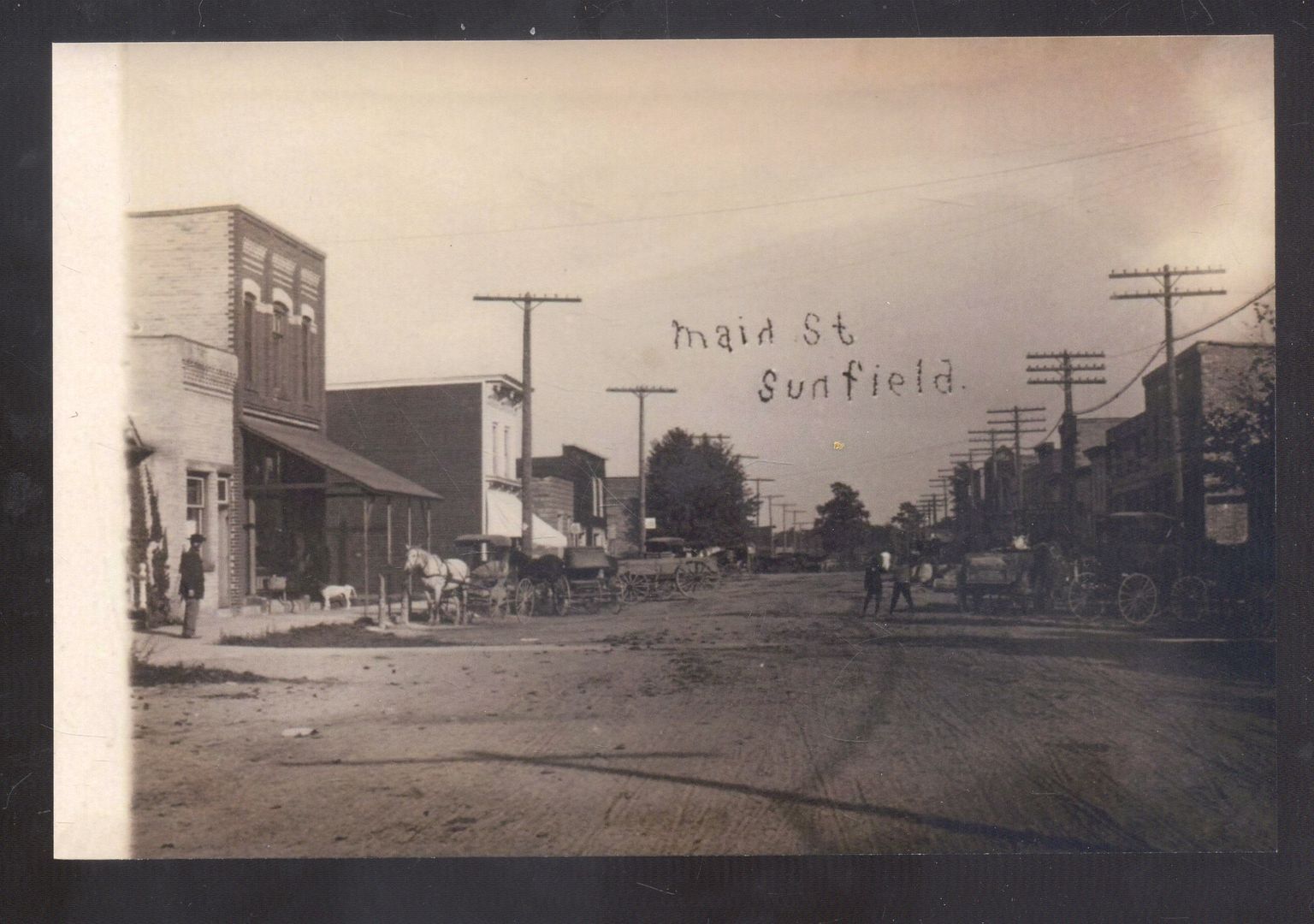REAL PHOTO SUNFIELD MICHIGAN DOWNTOWN MAIN STREET SCENE POSTCARD COPY ...