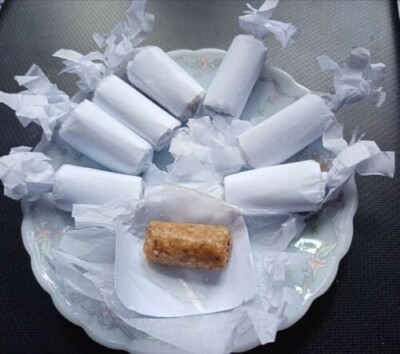 Gingerly rolls ,sesame curls ,gingili balls sweetmeats 10 X rolls free ...