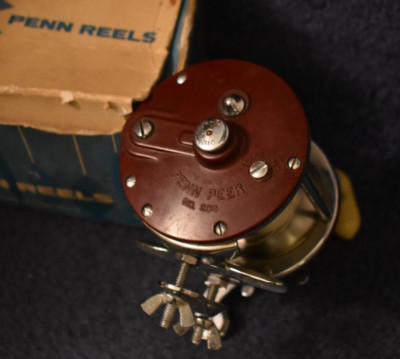 Vintage PENN Peer 209 Level Wind ~ Red Brown w/Ivory Handle / Star ...