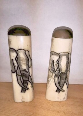 Bone carving Salt and Pepper shaker. Elephant with scratched decoration ...