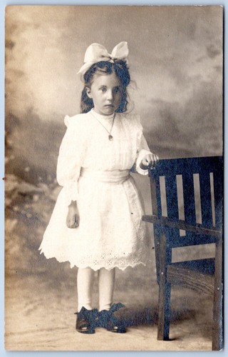 Postcard RPPC Cute Little Girl In White Dress Big Hair Bow Studio Photo ...