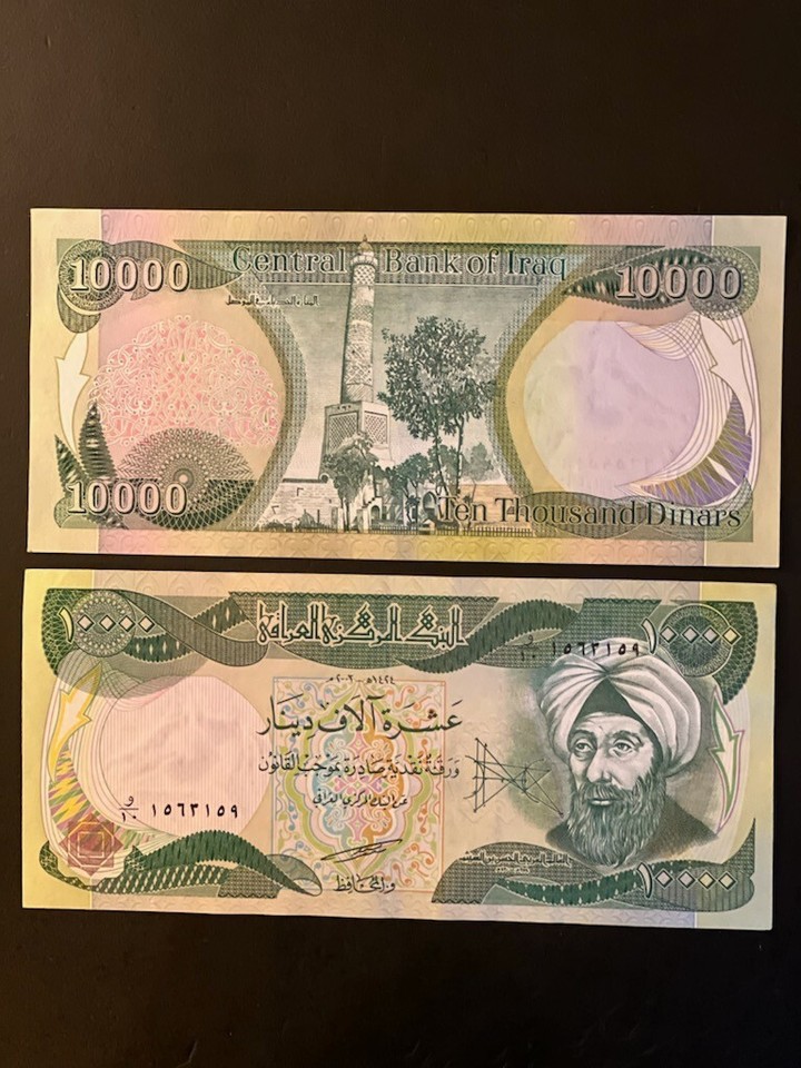 40,000 IQD, new crisp Uncirculated Iraq dinar banknotes. 4 x 10,000 ...