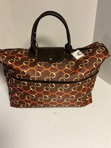 Toss Designs Large expandable travel bag in Bridle design | eBay