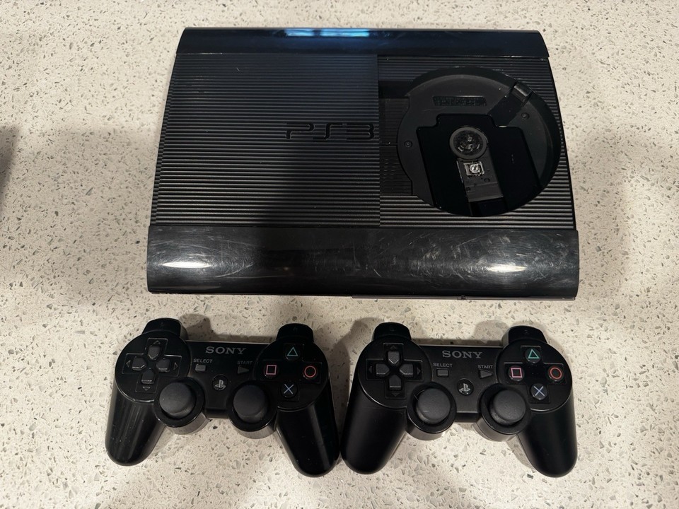 PlayStation 3 Super Slim, 500GB Console, 2 Controllers, 10 Games, And ...