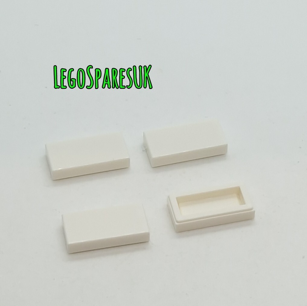 LEGO Part 306901 / 3069 Tile 1 x 2, White. Quantity x 4 | eBay