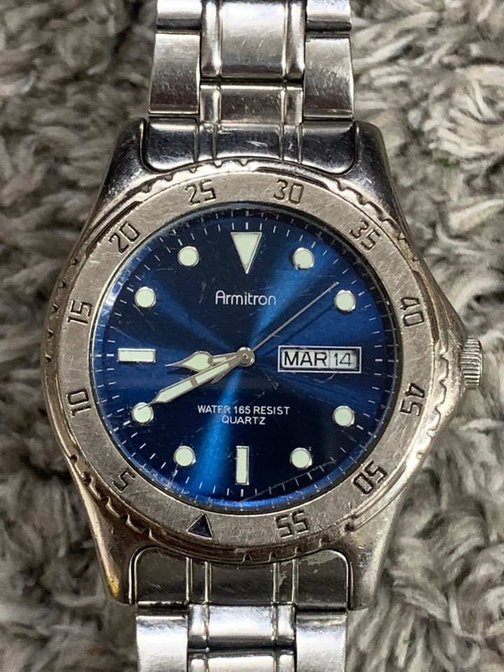 Armitron 20/1199 2105 Rotating Bezel Day Date Blue Dial Quartz Watch ...