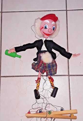 Scottish Marionette String Puppet dressed in quilt holding a bottle ...