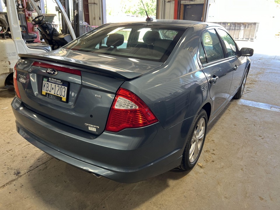 10-12 FORD FUSION REAR BUMPER COVER W/ 2 EXHAUST CUTOUTS STEEL BLUE ...