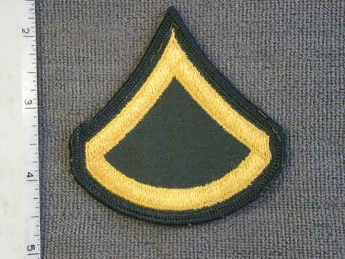 1968 -1985 issue U. S. Army Private First Class gold on green Chevron ...