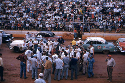 drivers meet officials start-finish line before dirt track Cup race Old ...