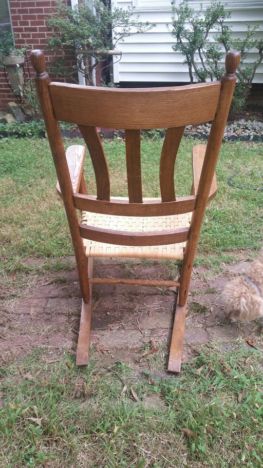 Woven splint seat oak rocker with pressed leaf & flower design on the ...