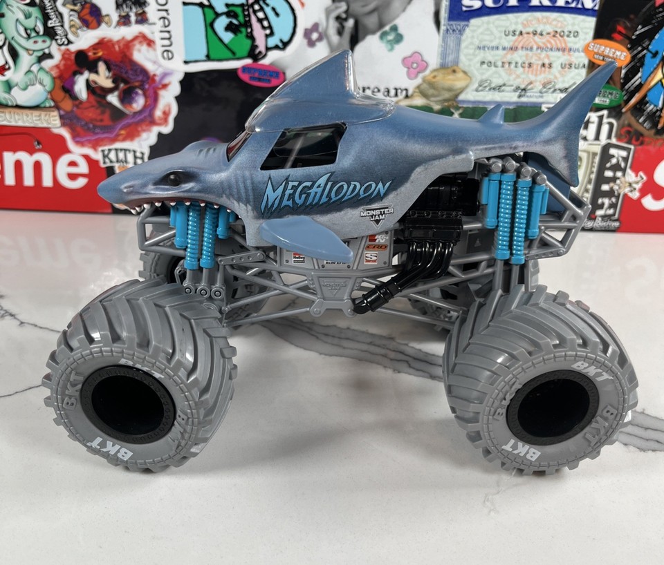 Spin Master Monster Jam Megalodon Blue Metal BKT Tires Shark Free ...