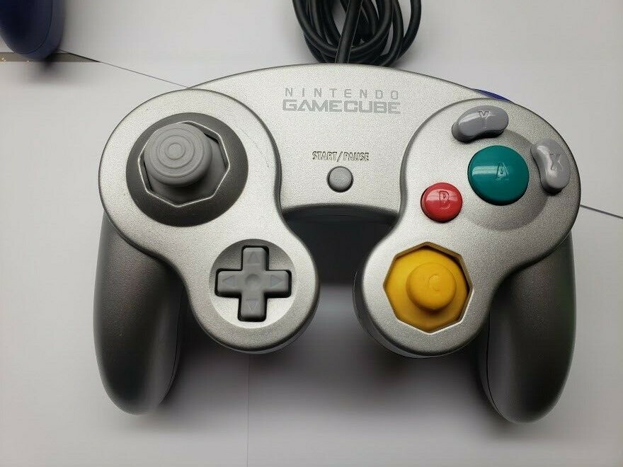 Two Silver Gamecube Black Controller With Black Controllers With One ...