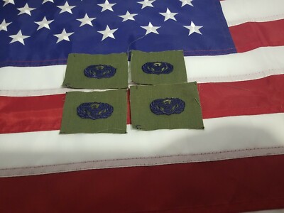 Lot of 20 qualification af subdued security police basic badges sewn on ...