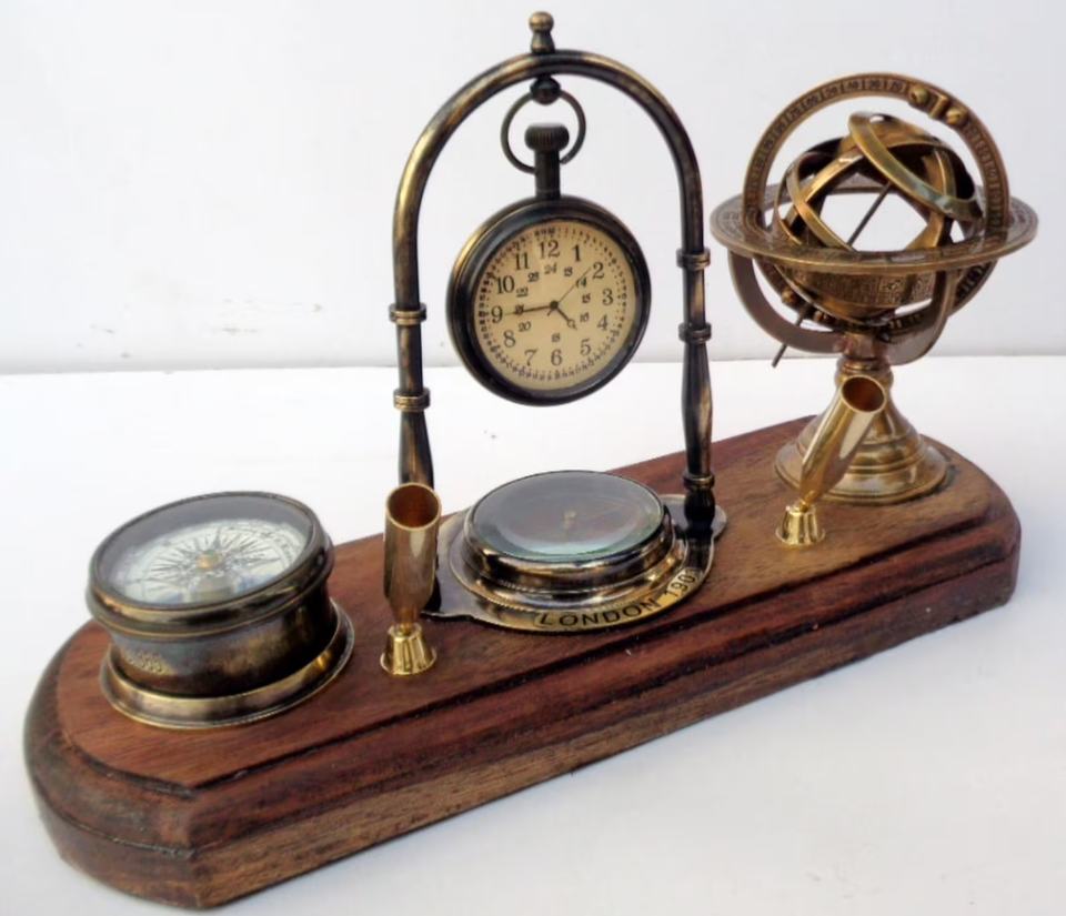 Antique brass table top clock with pen holder compass armillary sphere ...