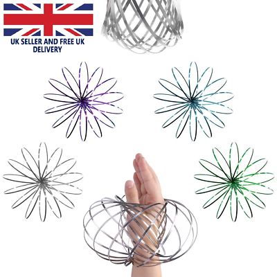 Magic Flow Rings Toys Kinetic Spring Slinky Juggle Indoor Holiday Home ...