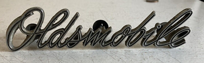 Vintage Oldsmobile Script Nice Grill Emblem Name Plate GM 398176. | eBay