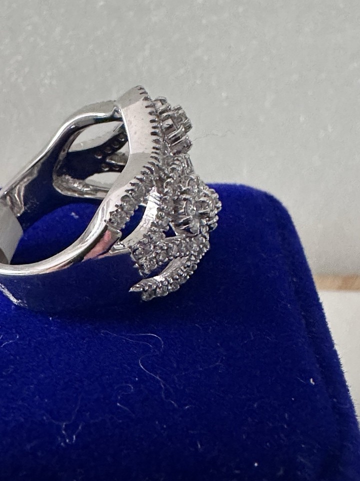 14kt.w/gold cluster ring with 2.25ct, round diamonds, size 8. 11.8grams ...