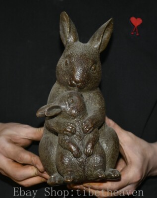 Figurines - Boy With Rabbit