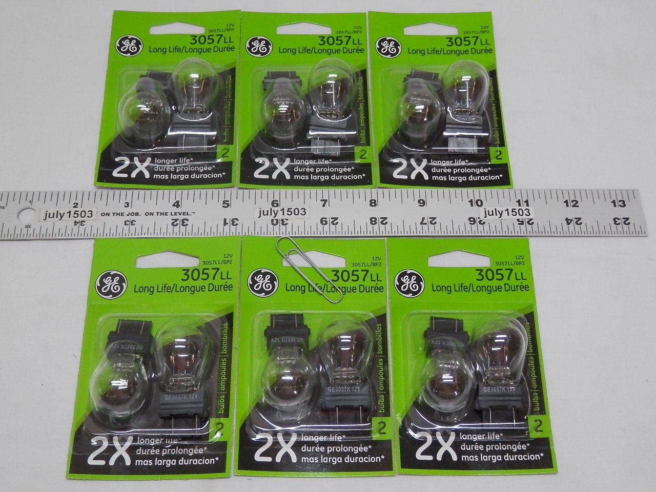 (12) New GE 3057LL Miniature Lamp Bulb 27w 7w Plastic Wedge 12 volt S8 ...