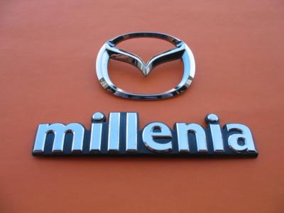 99 00 01 02 MAZDA MILLENIA REAR LID CHROME EMBLEM LOGO BADGE SIGN ...