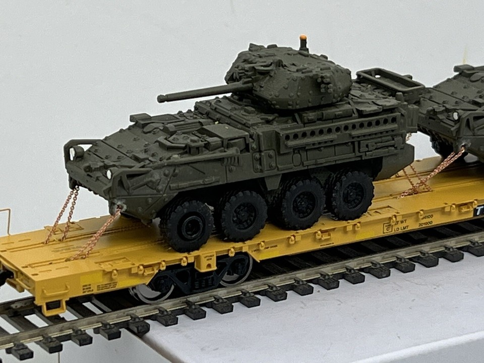 Walthers 920-104607 89’ TTX TPDX flat car w/3 army or Marine Stryker ...