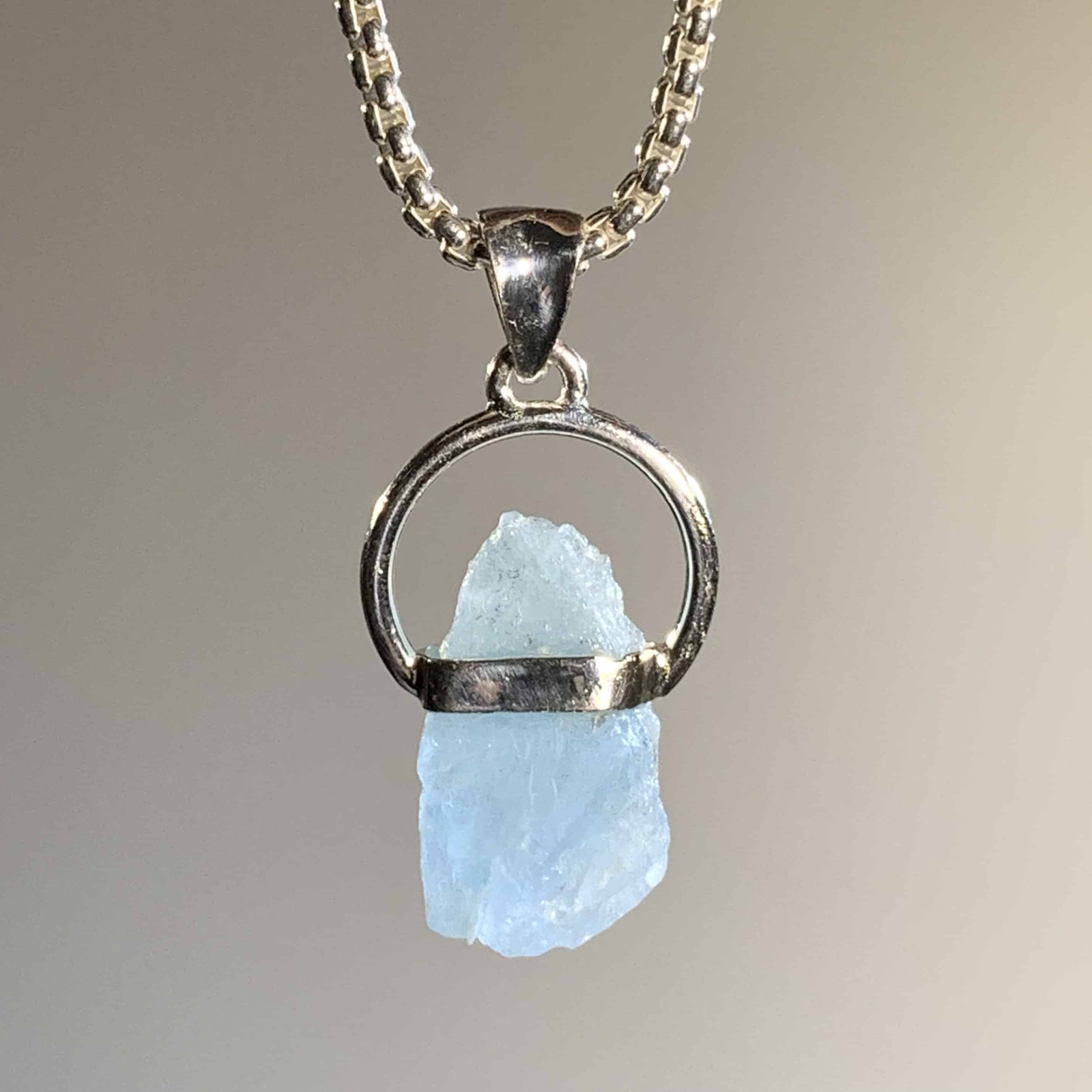 Aquamarine (blue) bezeled O-ring pendant healing crystal | eBay