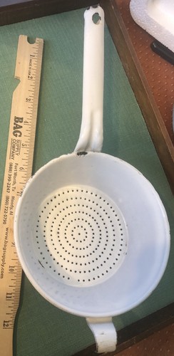 Vintage white enamel long handled sieve colander over pan hook ...