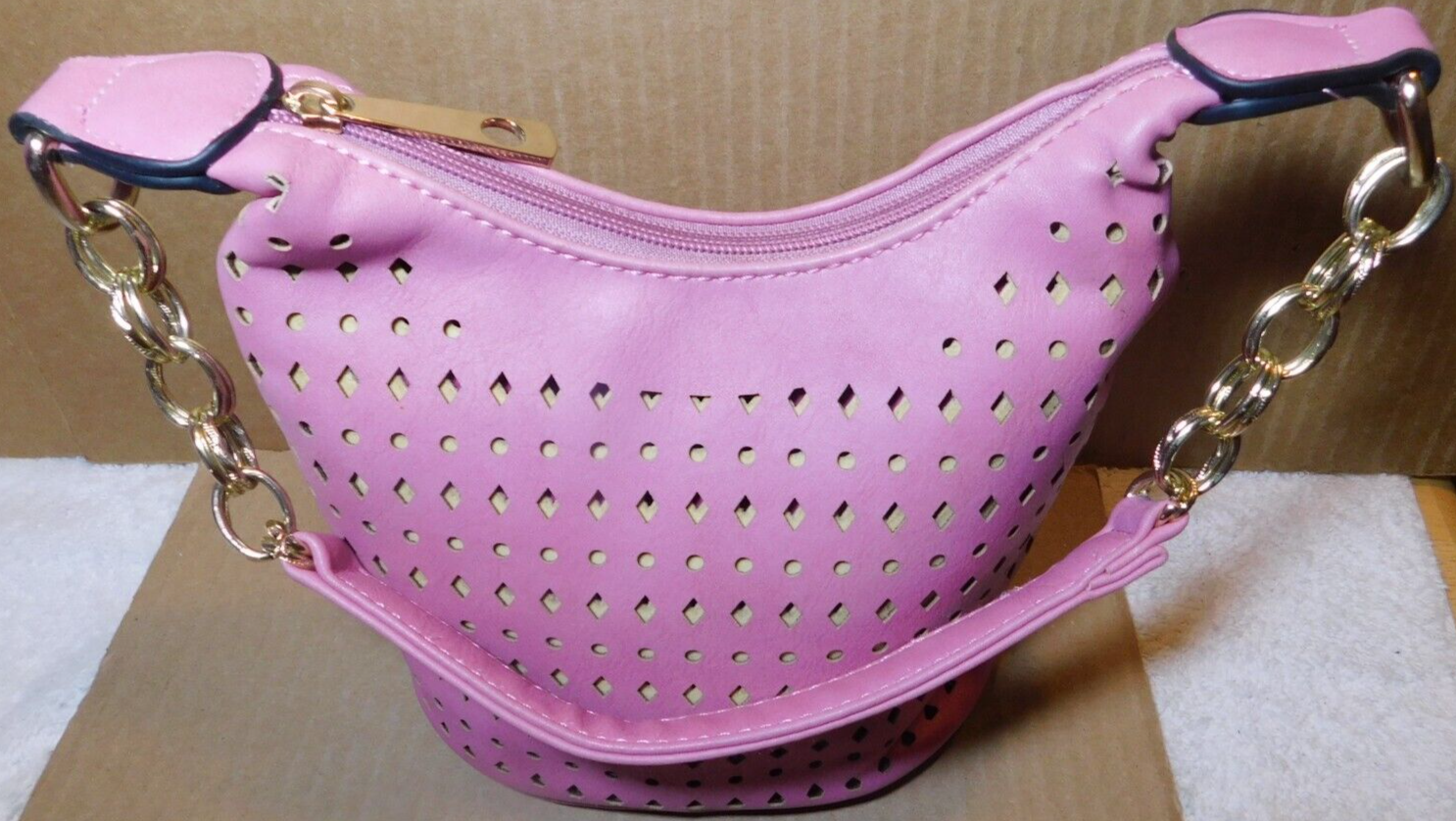 Unbranded~Pink Handbag/ Purse With Hole Punches Design on Outside | eBay
