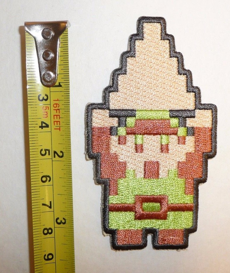 8 Bit Link Holding Triforce