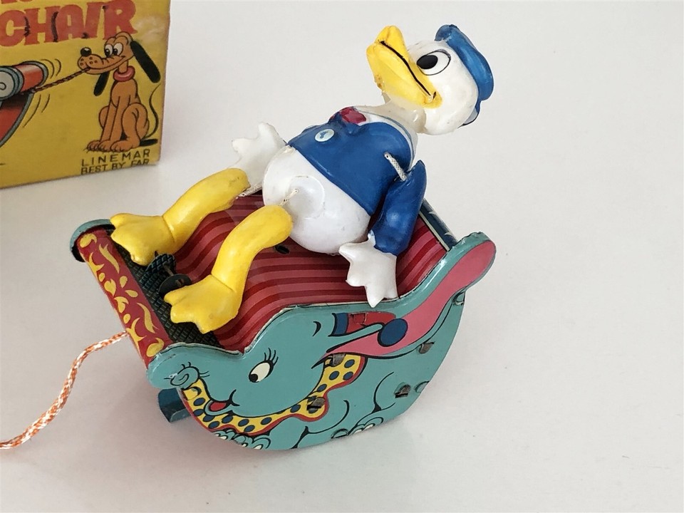 1940s MARX WALT DISNEY CELULOID DONALD DUCK RIDING TIN WIND UP DUMBO IN ...