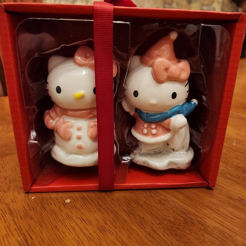 Hello Kitty Salt & Pepper snow play ice skating pink winter holiday ...