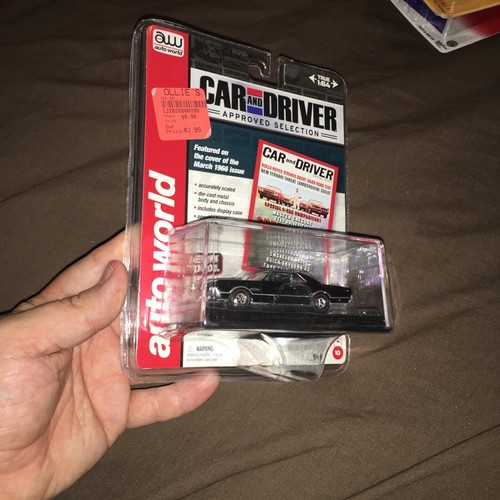 2013 Auto World Premium Licensed 1966 Black Oldsmobile 442 Car and ...