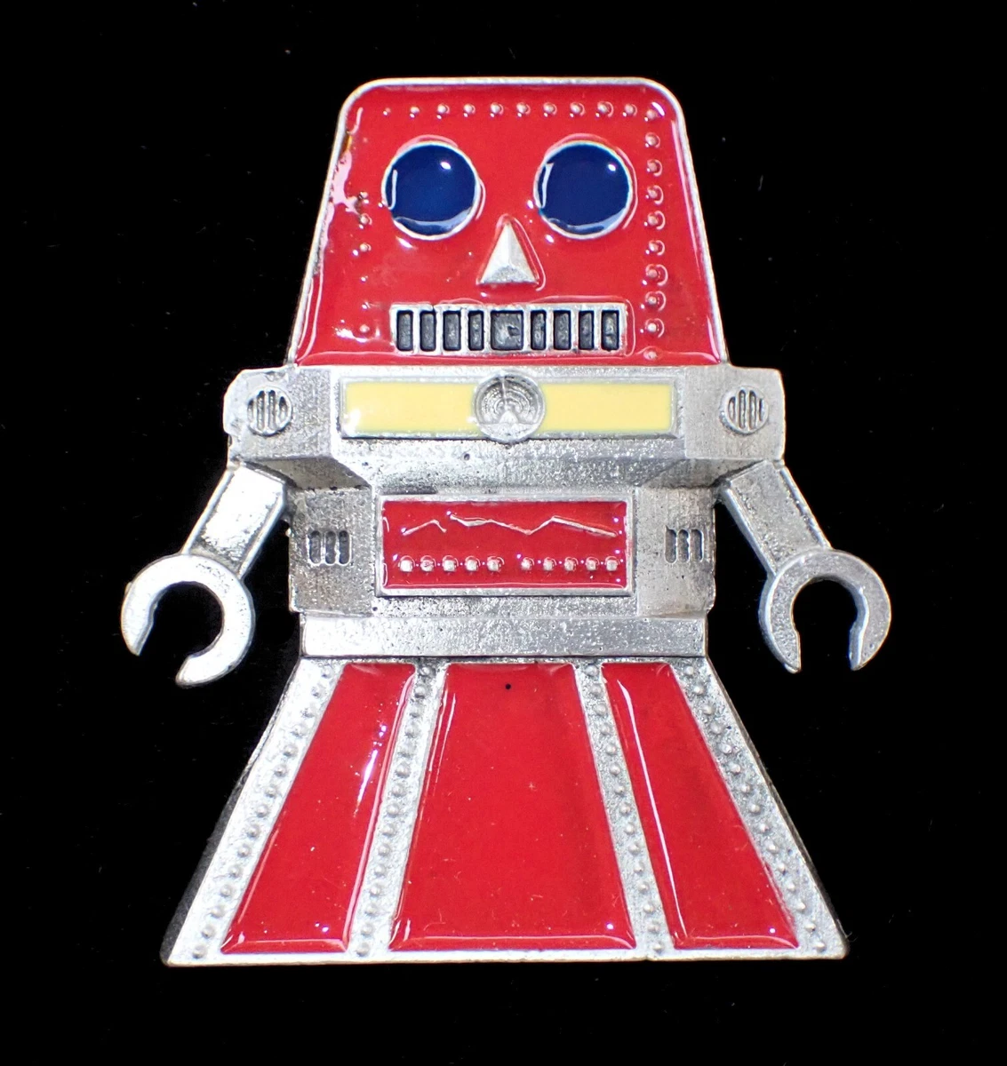 A Toy Robot On A Belt
