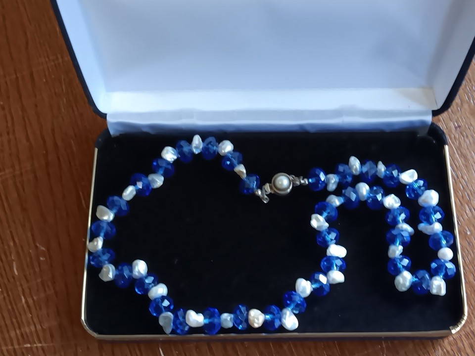 Lovely necklace with cobalt blue & white beads. Sterling silver clasp ...